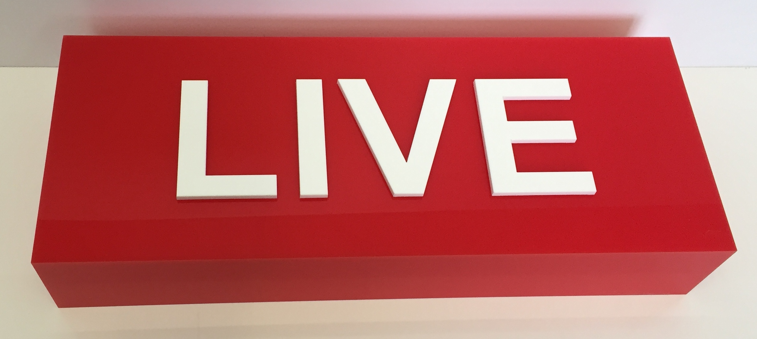 ‘LIVE’ lightbox made from LED spectrum Red Perspex 2 – XG Plastics Ltd